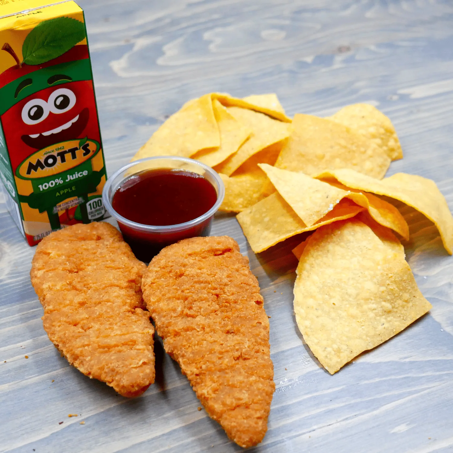 Chicken Tenders (2) with Chips & Juice – Tacoholics – Taco Restaurant ...